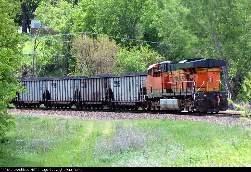 BNSF 6204, GE ES44AC, eastbound DPU shoves hard against the NS "Top Gon" coal loads